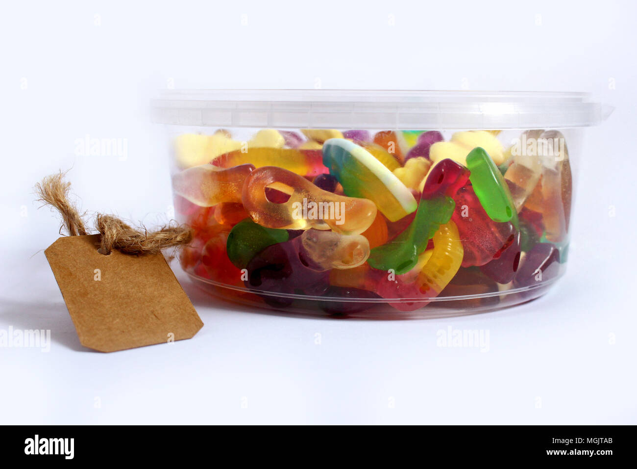 Gummy candies in a see through round box Stock Photo - Alamy