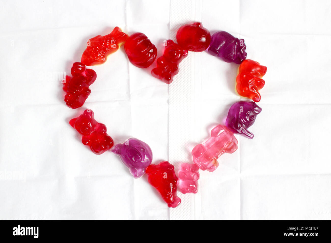 Heart consisting of Gummy candies Stock Photo - Alamy