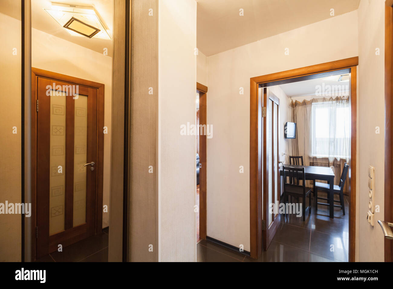 Modern living flat interior, hallway with open door and window Stock ...