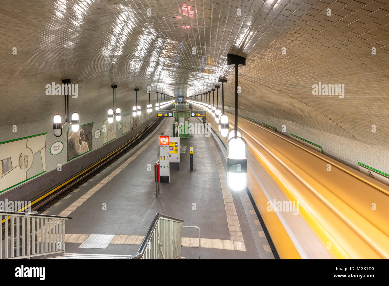 Early morning commuters depart one of the frequent metro (U-Bahn ...