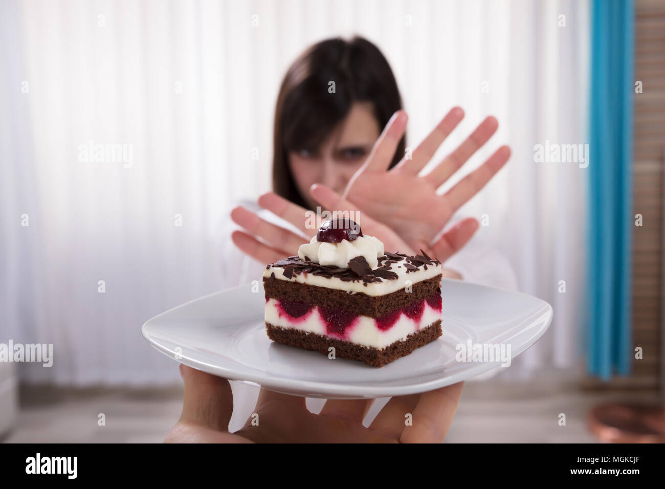 Woman Refusing Slice Of Delicious Cake Offered By A Person Stock Photo ...