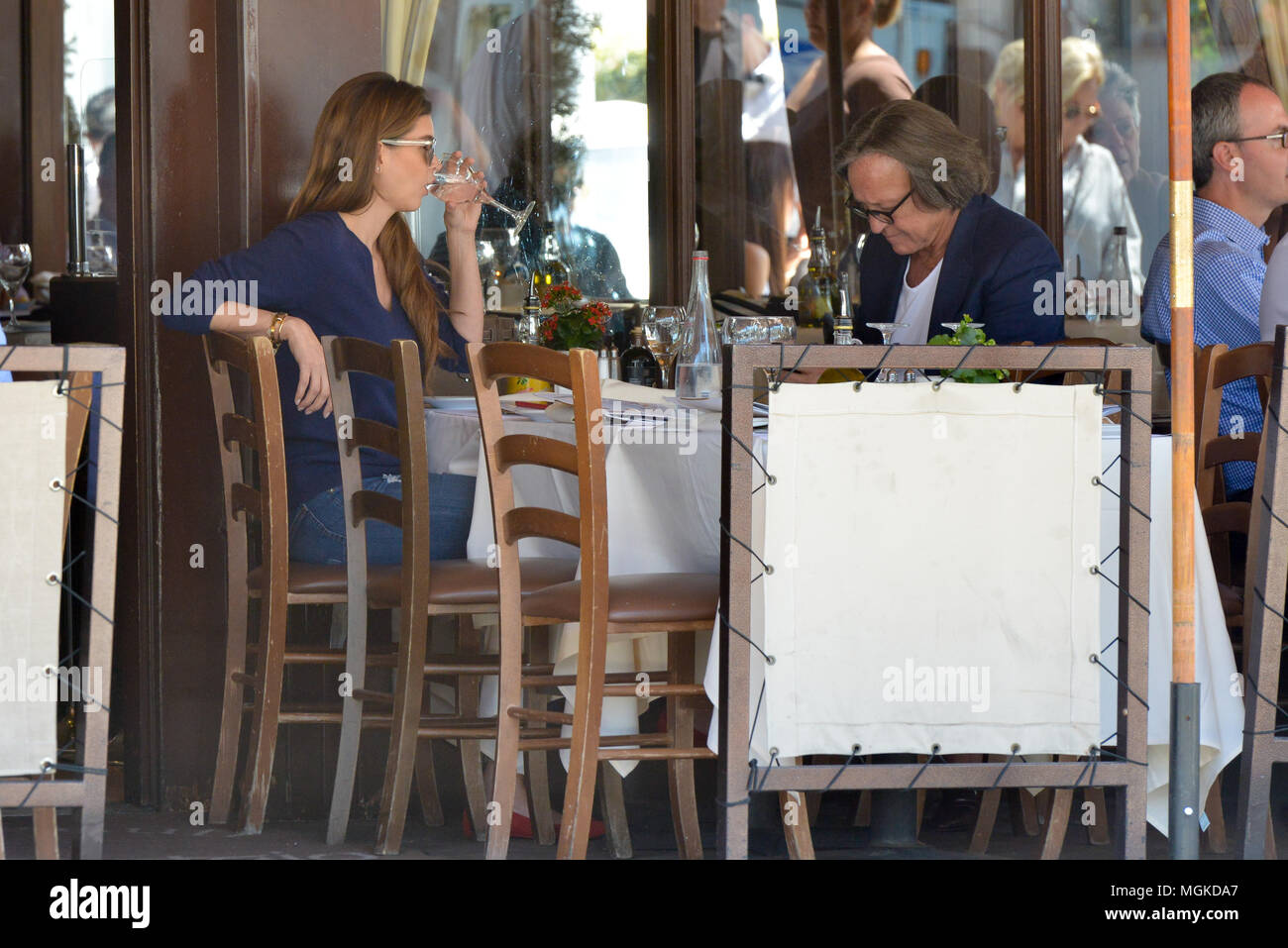 Mohamed Hadid and his girlfriend Shiva Safai at 'Il Pastaio' Italian ...