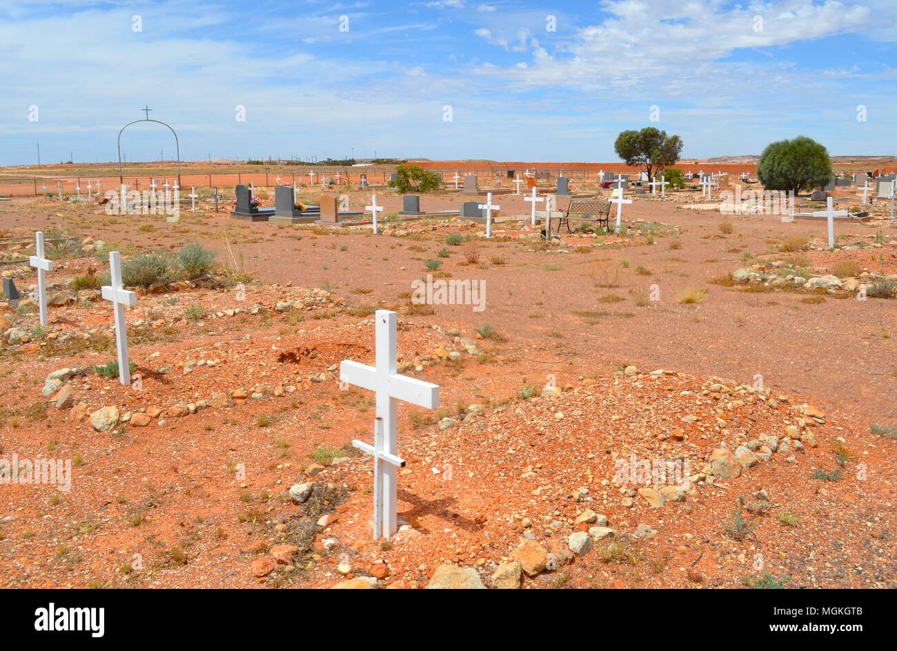 Dry dusty desert outback graveyard with white crosses near Coober Pedy ...