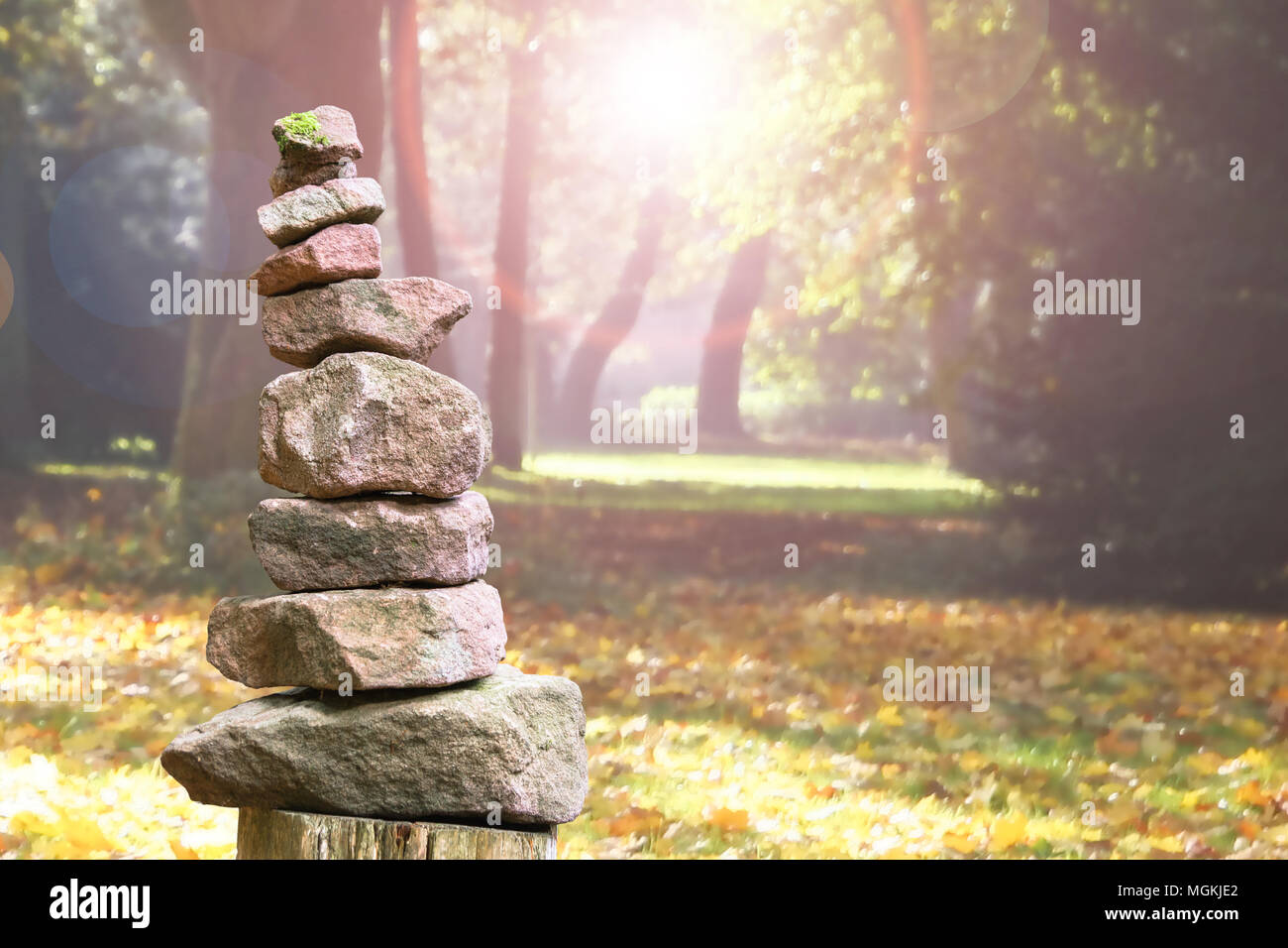 Stacked stone pyramid from sandstone in an autumnal park Stock Photo ...