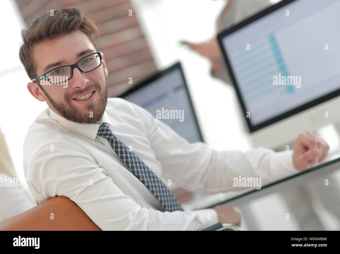 experienced programmer sitting in front of the monitor Stock Photo - Alamy