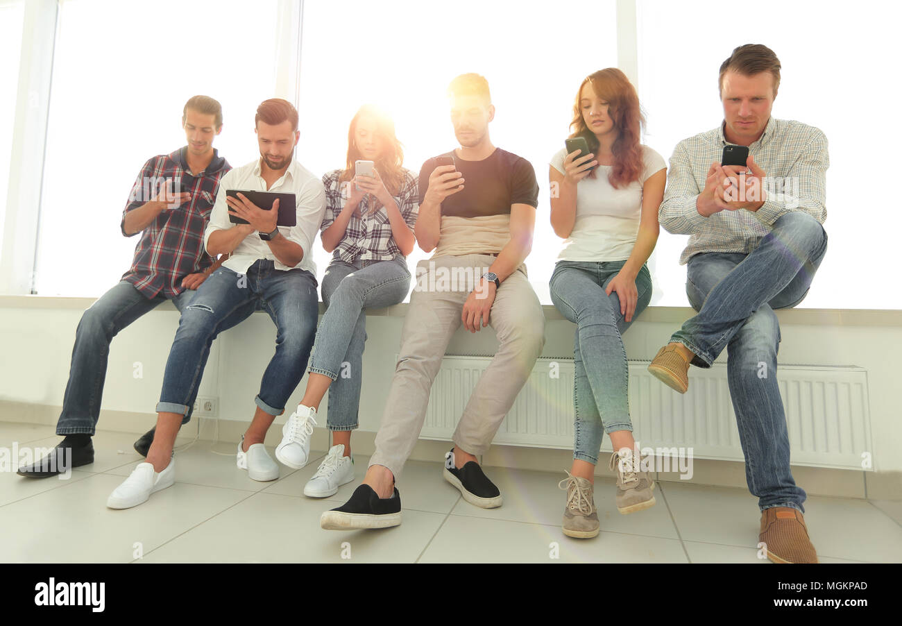 business team using modern gadgets Stock Photo - Alamy