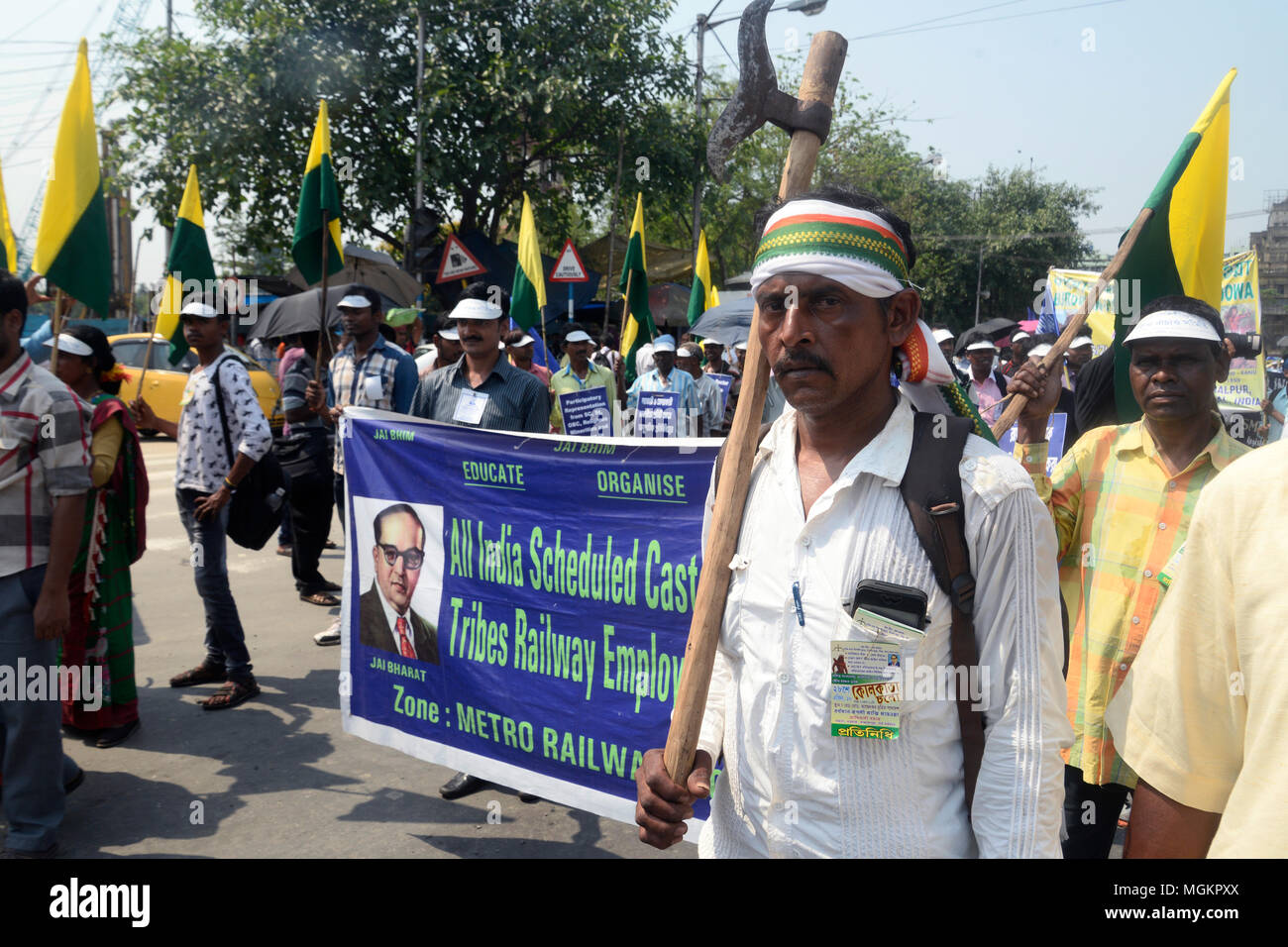 Kolkata, India. 28th Apr, 2018. SC, ST and OBC people hold poster and ...