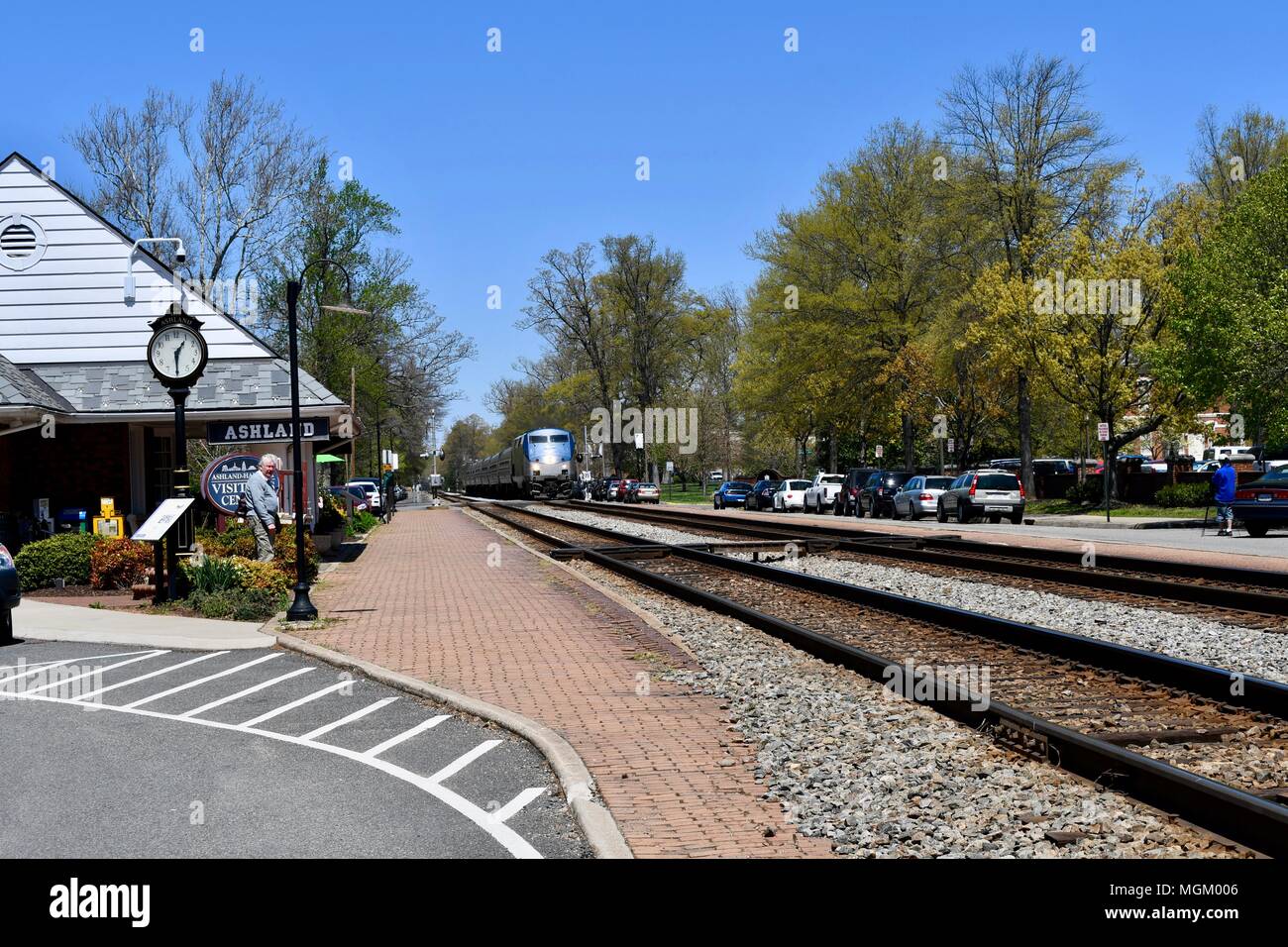 Amtrak train coming through Main Street of a small town in America ...