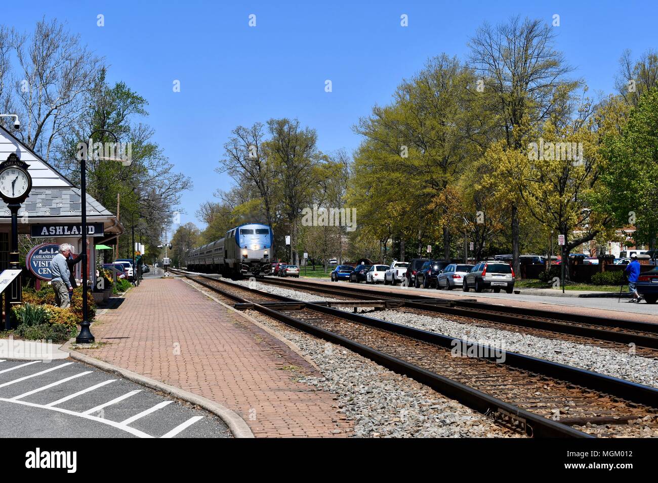 Amtrak train coming through Main Street of a small town in America ...