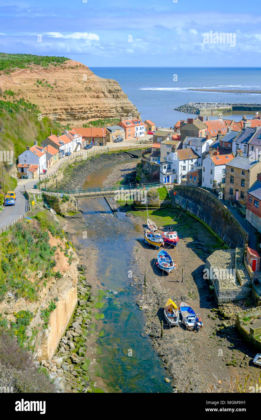 The view looking seawards over the harbour of the North Yorkshire ...
