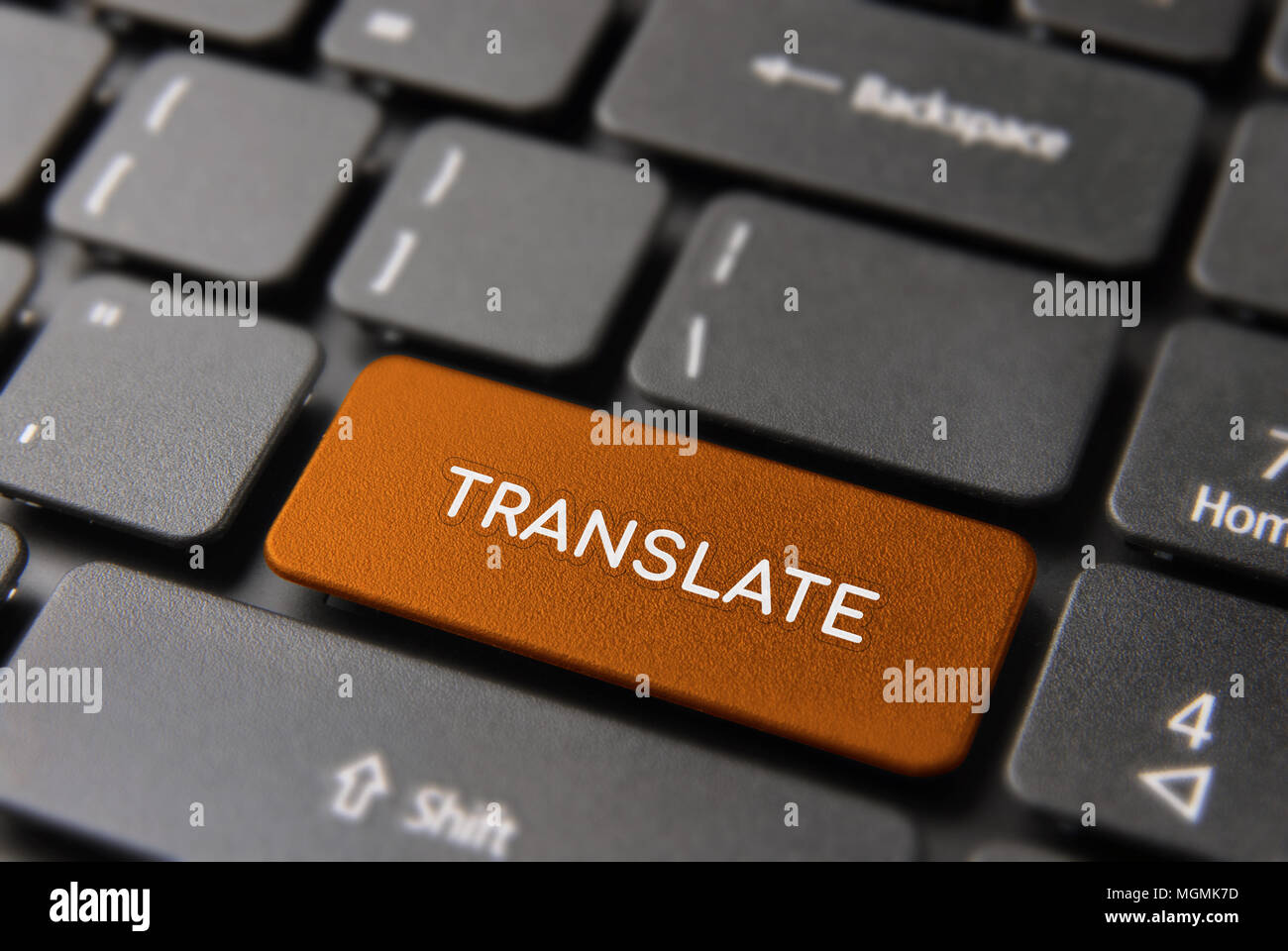 Language translation service concept, red computer button with ...