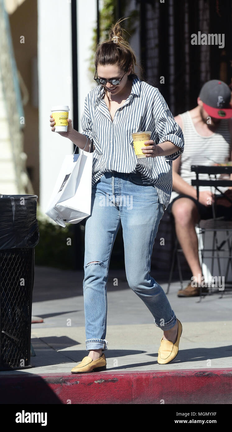 Elizabeth Olsen gets a couple of coffees Featuring: Elizabeth Olsen ...