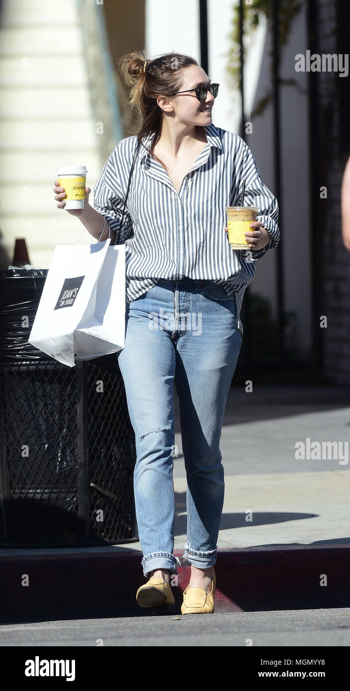 Elizabeth Olsen gets a couple of coffees Featuring: Elizabeth Olsen ...