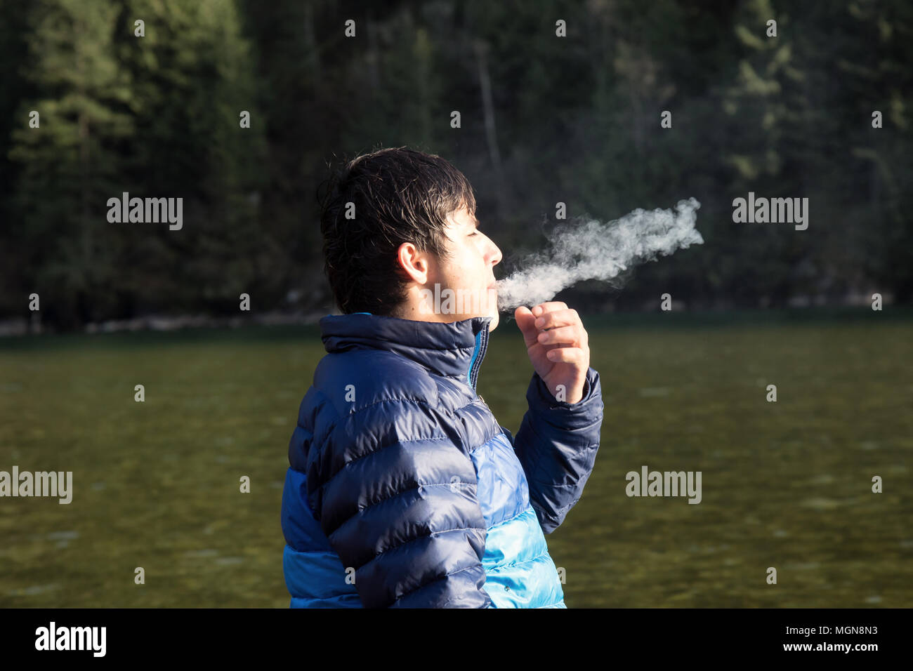 Man smoking joint outdoors hi-res stock photography and images - Alamy