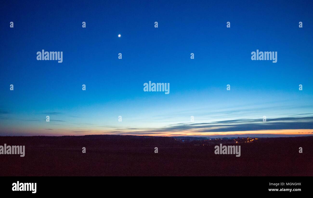 Late evening sky over village near fields. Rural landscape Stock Photo ...