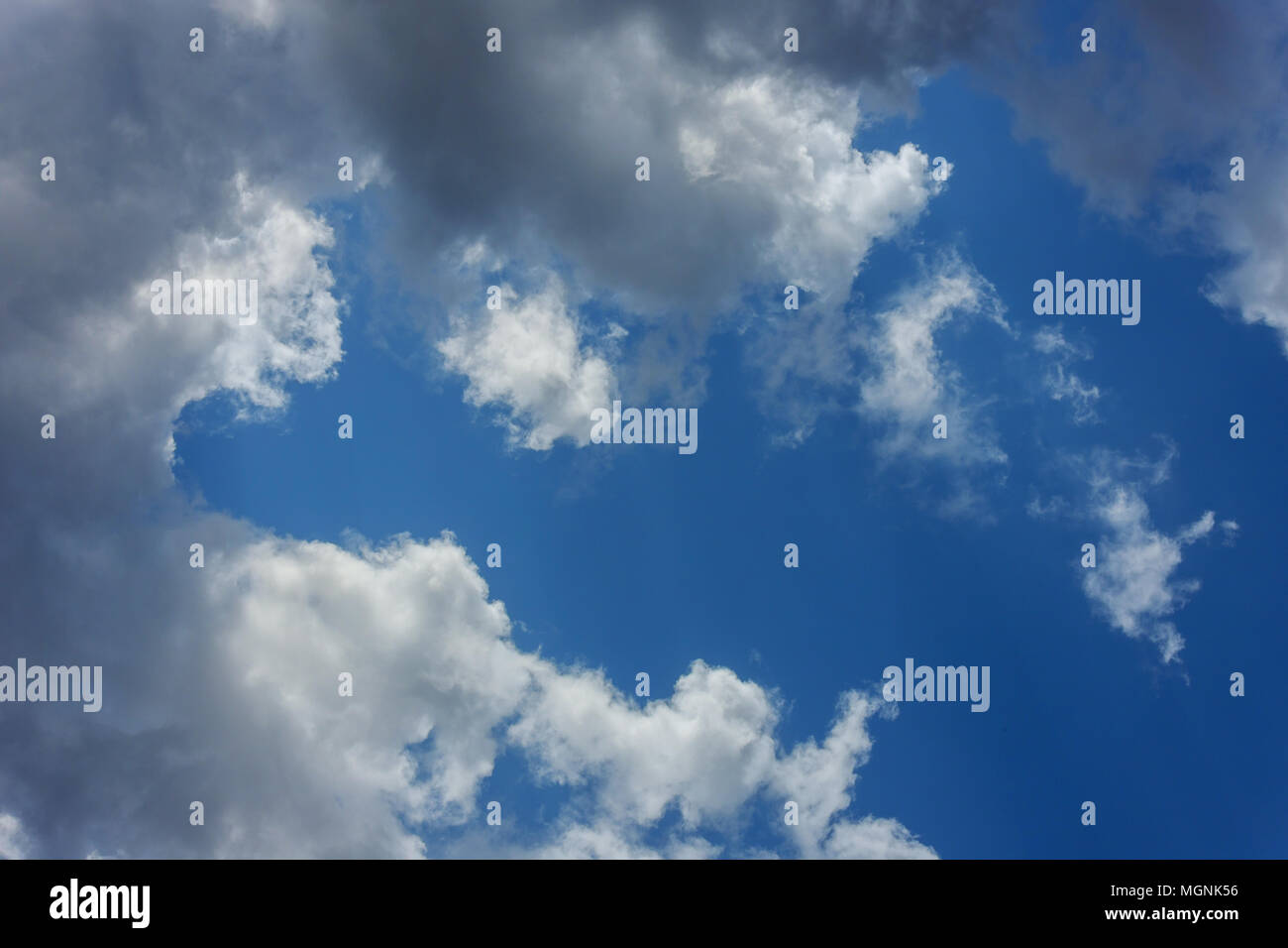Shot of blue sky with cloud closeup Stock Photo - Alamy