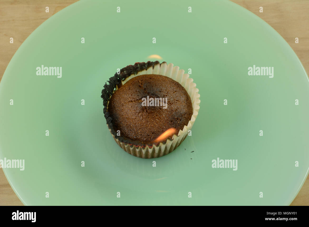 Burned muffin hi-res stock photography and images - Alamy