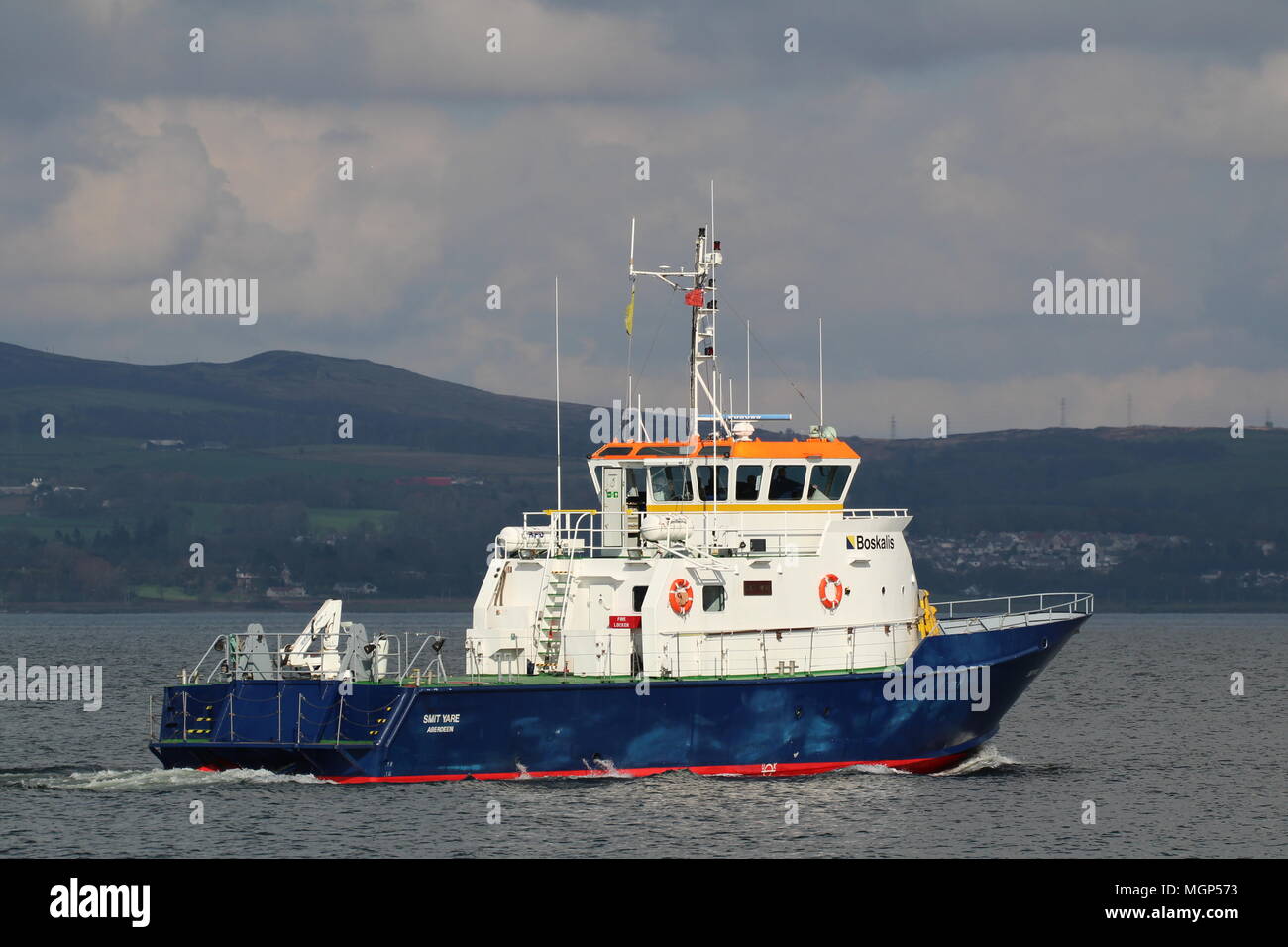 The aircrew training/naval support vessel MV Smit Yare, passing ...