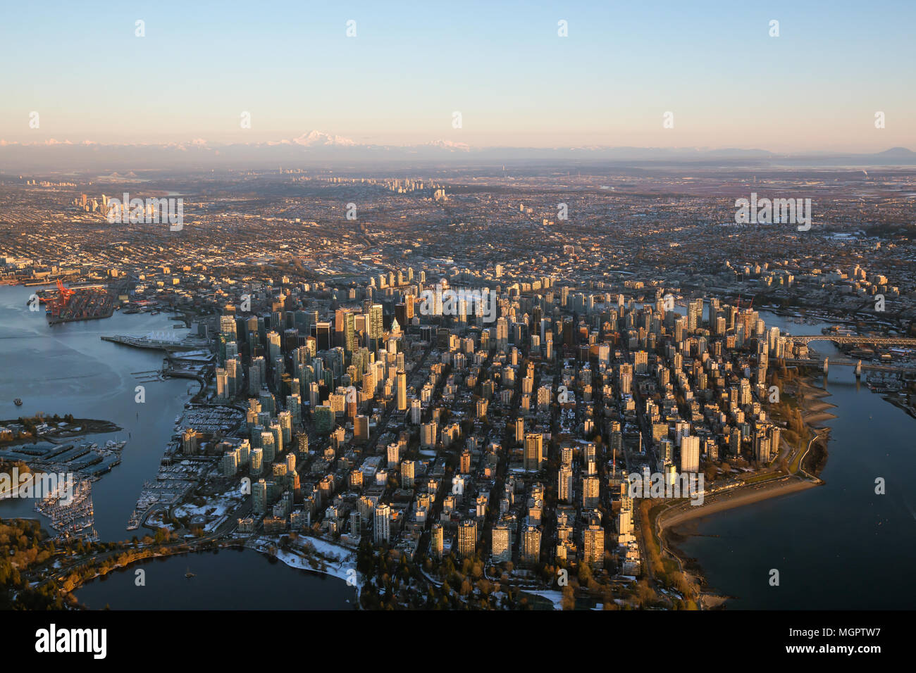 Aerial view of Downtown City during a vibrant sunset. Taken in ...
