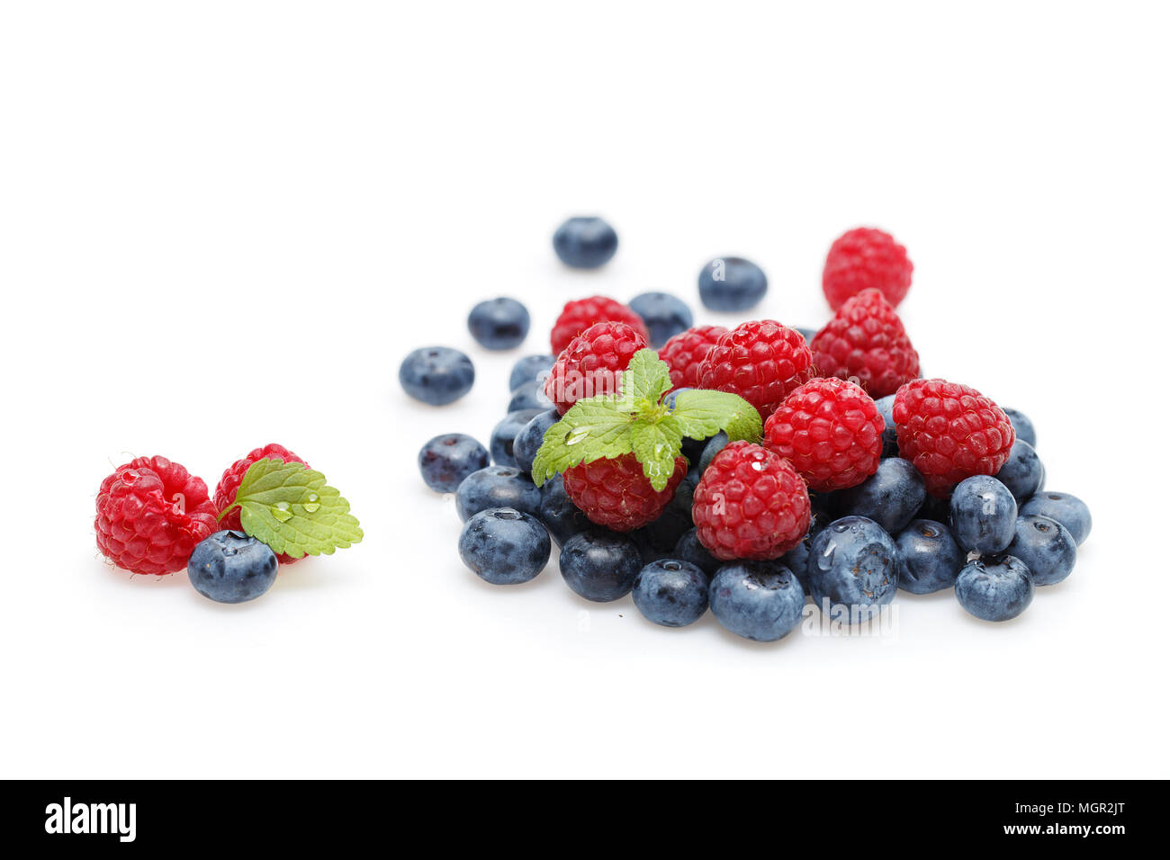 blueberry and raspberry berries isolated on white background Stock ...