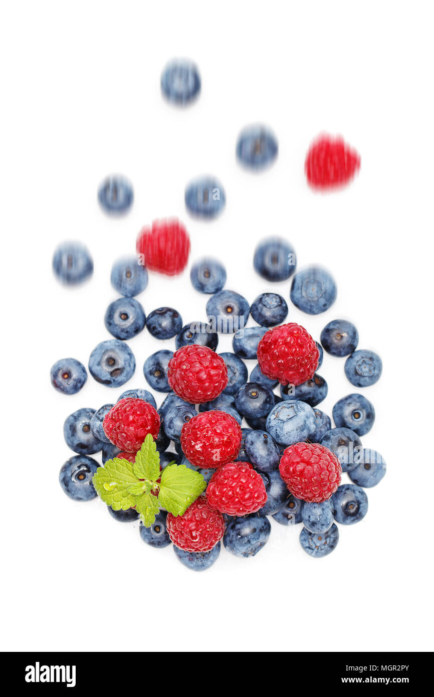 blueberry and raspberry berries isolated on white background Stock ...