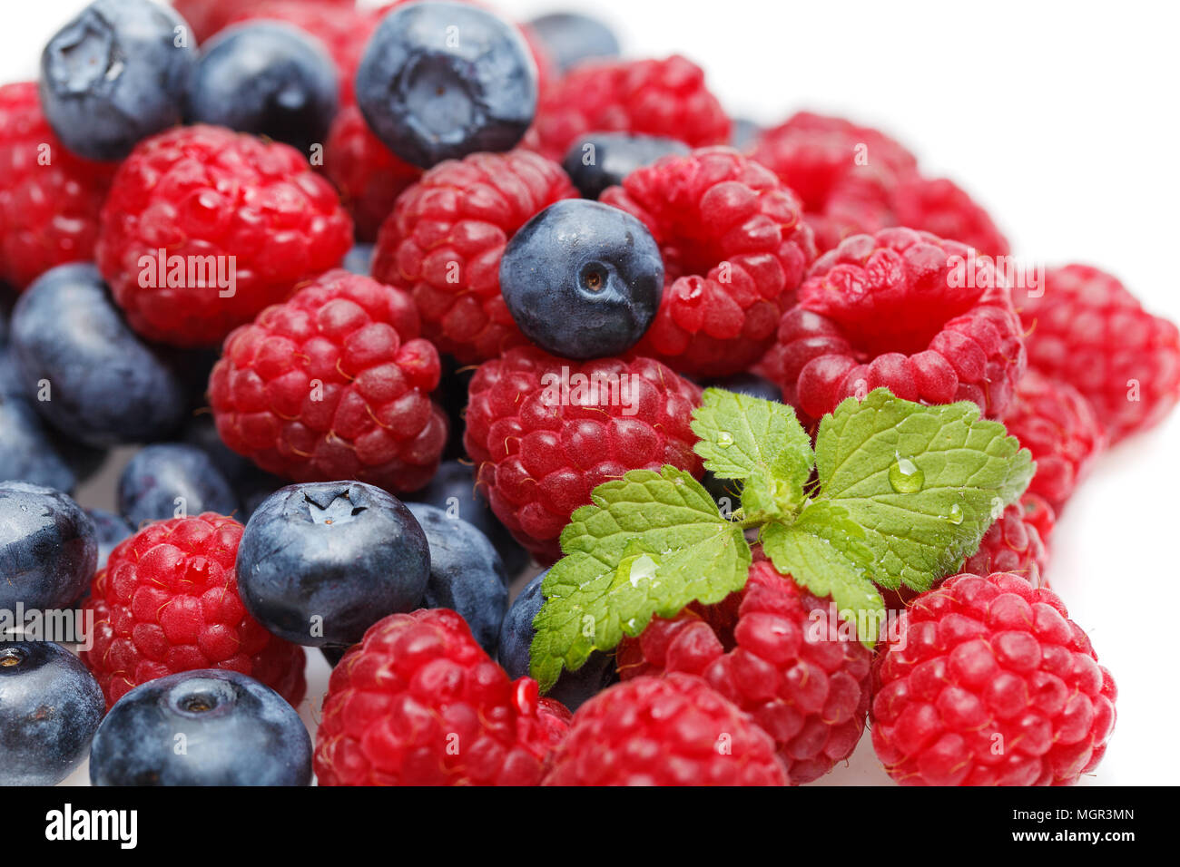 blueberry and raspberry berries isolated on white background Stock ...