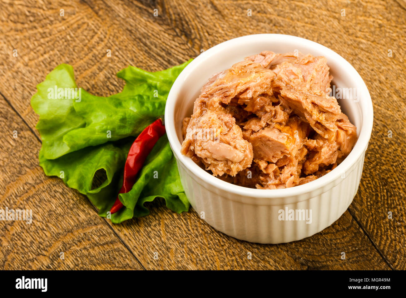 Canned tuna fish in the bowl ready for cooking Stock Photo - Alamy