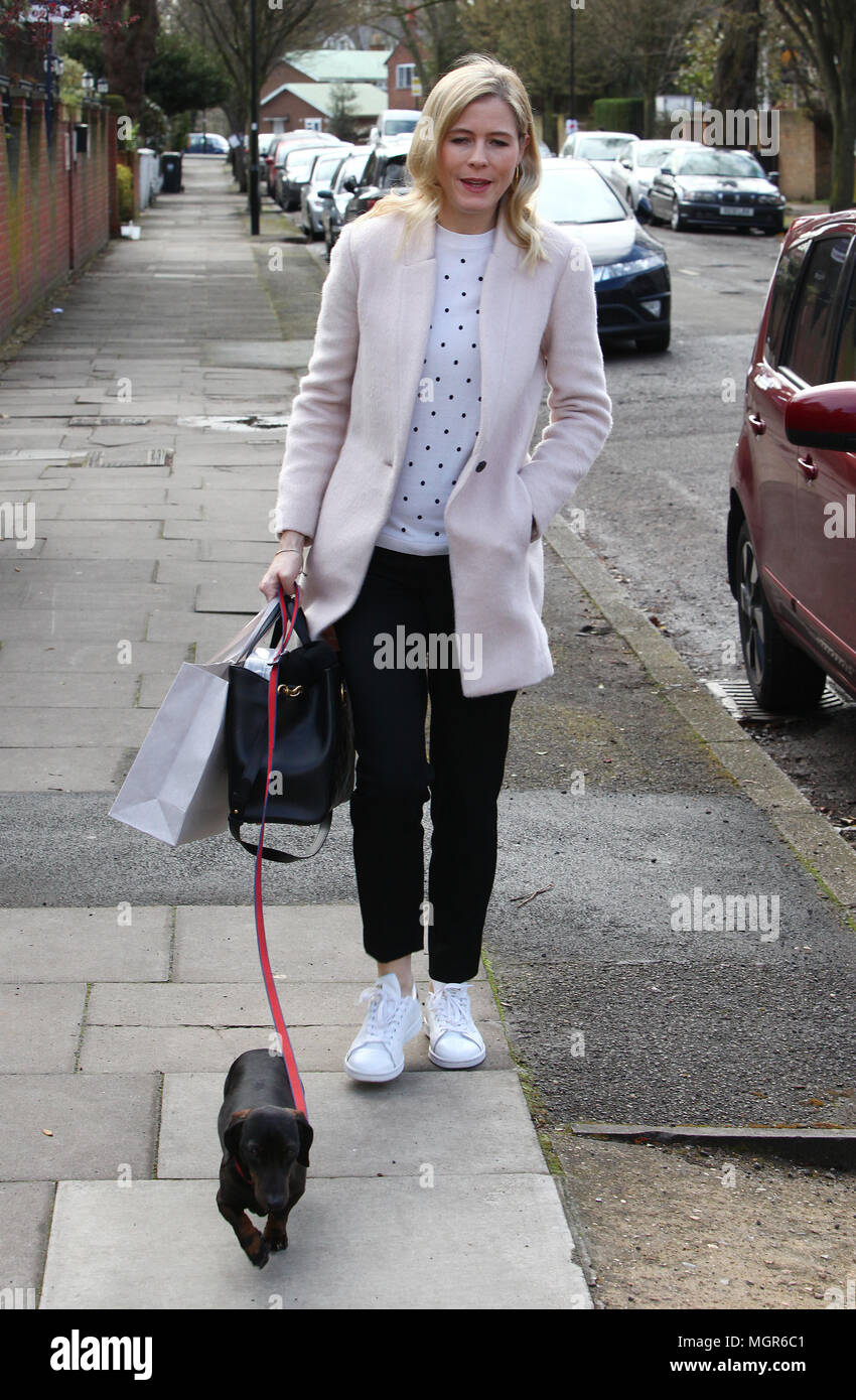 Pregnant Ali Astall heading to her office with her dog Featuring: Ali ...