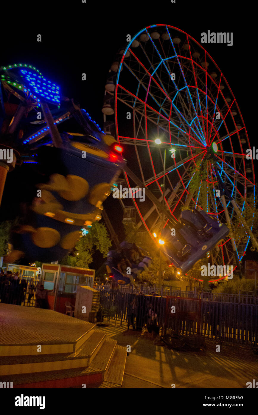picture for Iraqi kids riding some games in Zawraa park in Baghdad city ...