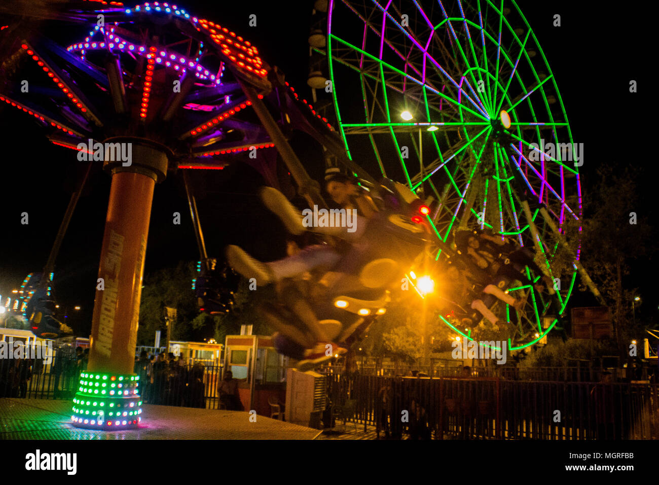 picture for Iraqi kids riding some games in Zawraa park in Baghdad city ...