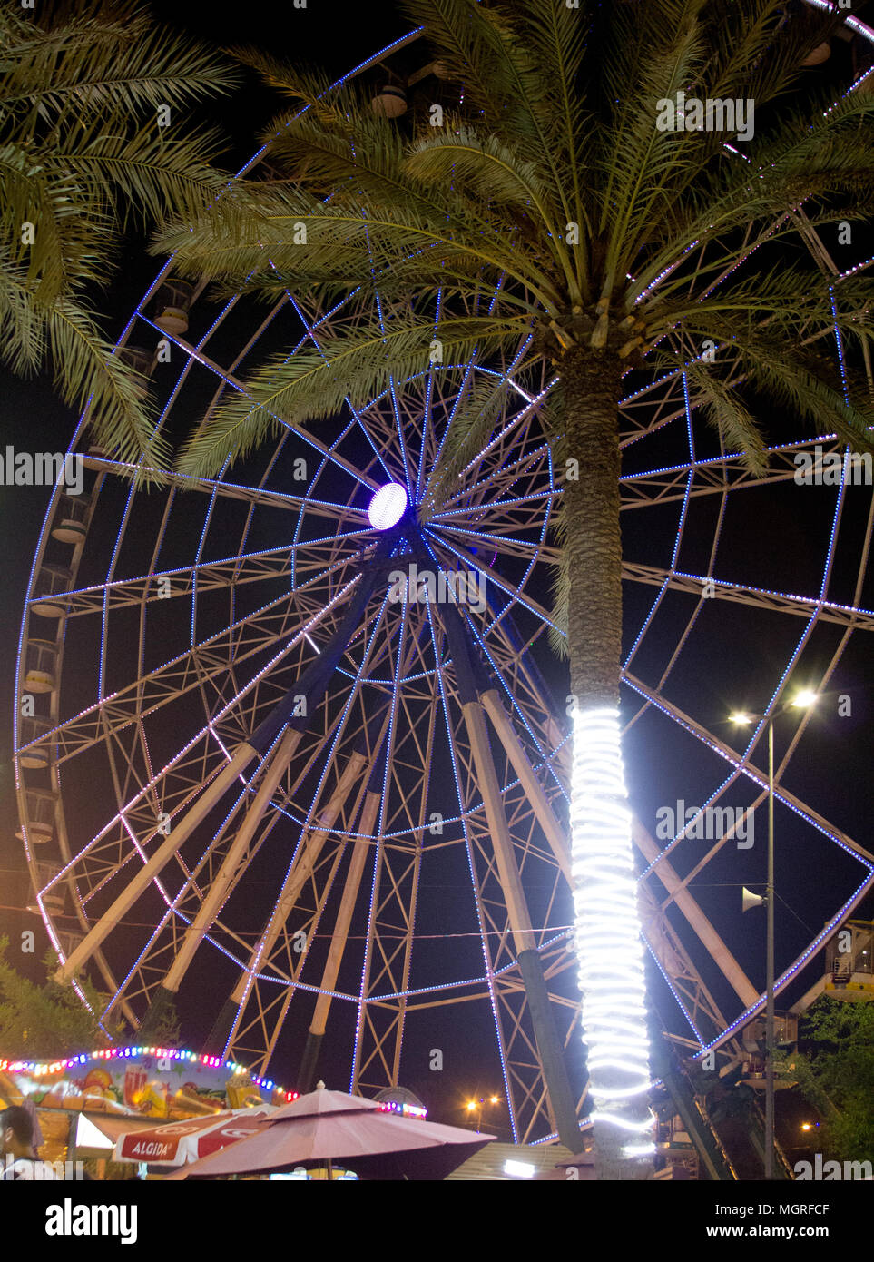 picture for Iraqi kids riding some games in Zawraa park in Baghdad city ...