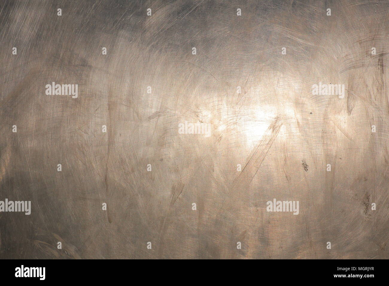 Bright shot of sunlight reflection on brushed metal surface Stock Photo ...