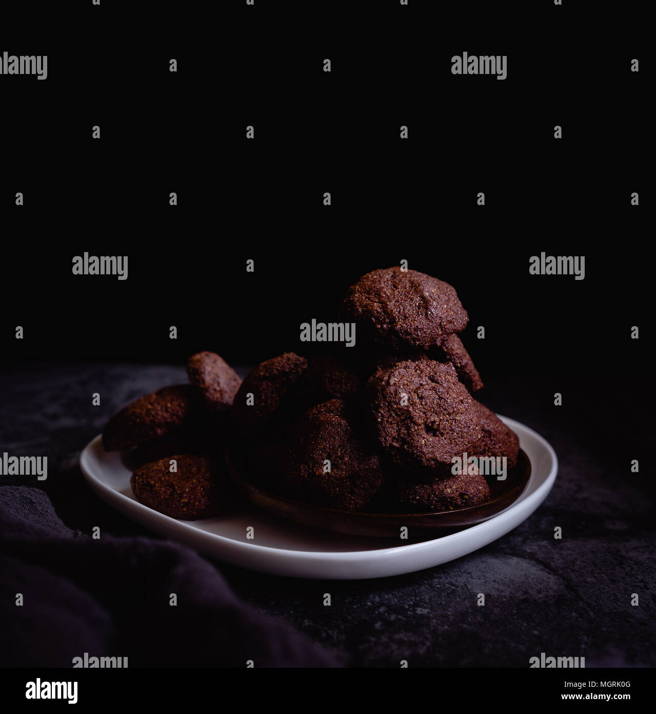 Chocolate Almond Oat Cookies, Dark Background Stock Photo - Alamy