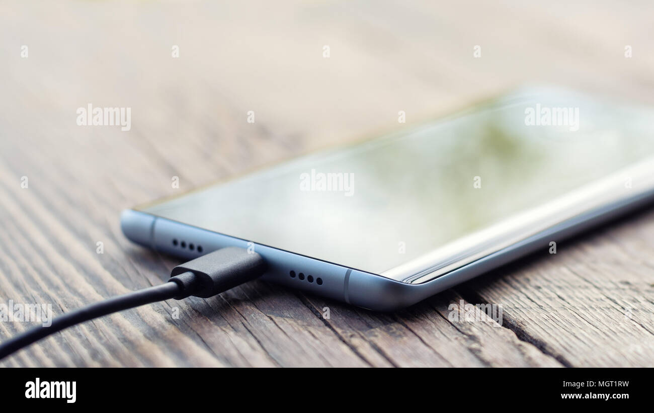 Smartphone is charging Stock Photo - Alamy