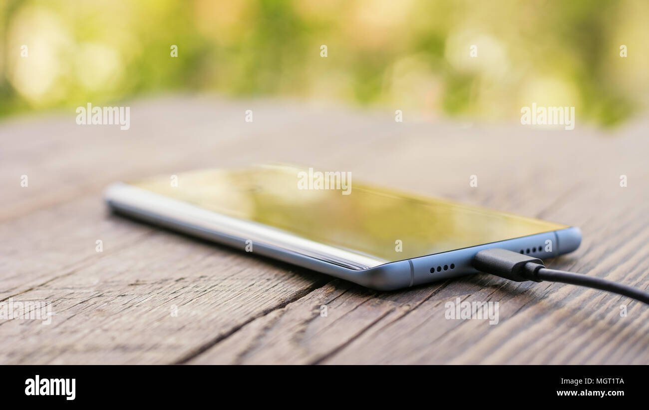 Smartphone is charging Stock Photo - Alamy