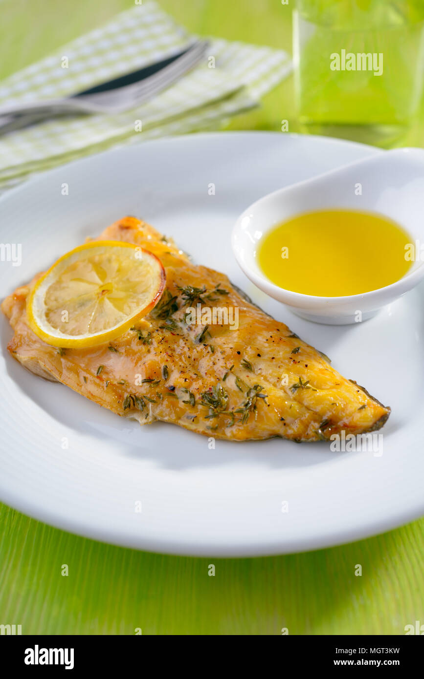 Roasted Arctic char on a plate Stock Photo - Alamy