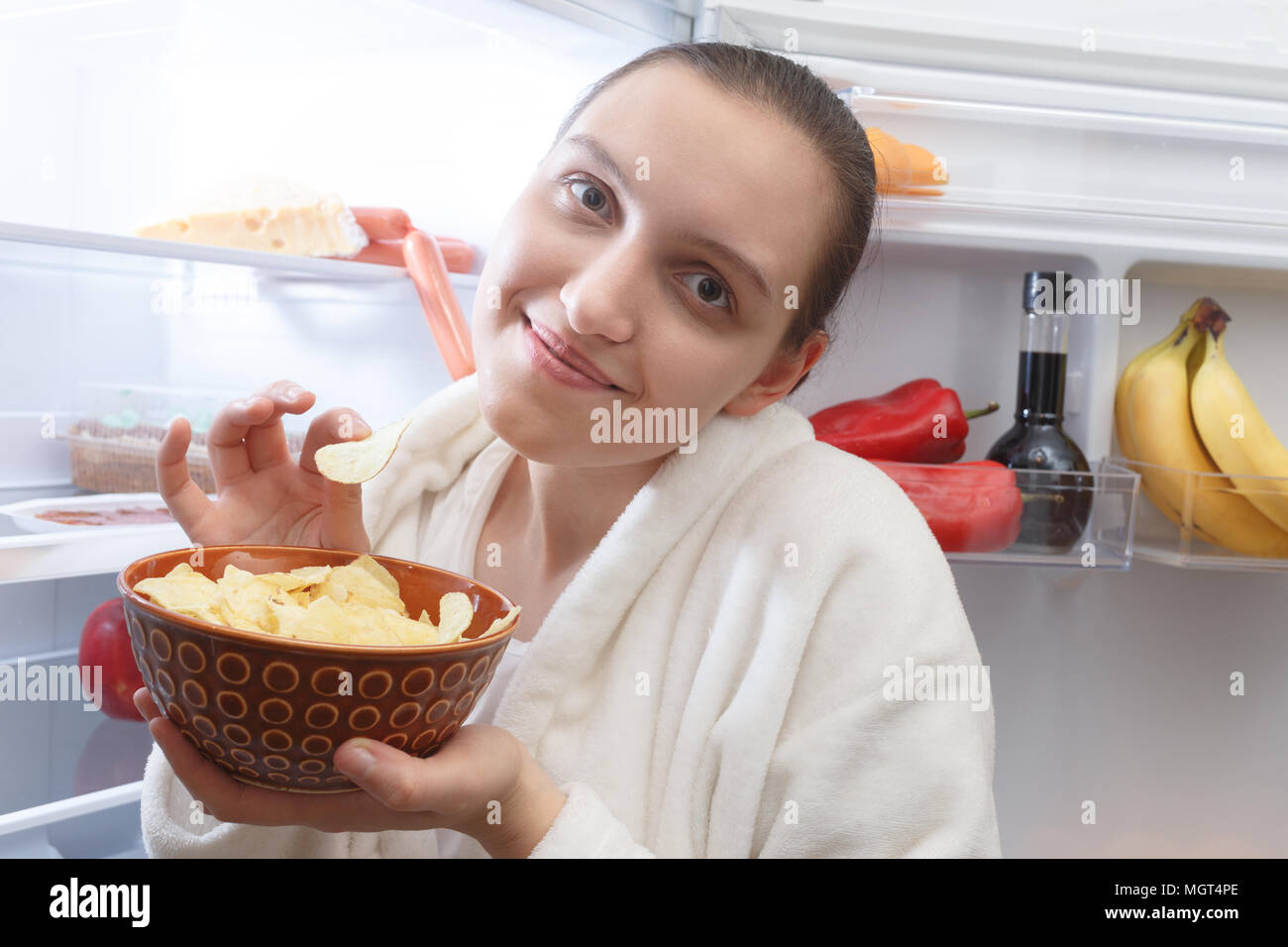 Woman Eating Chips High Resolution Stock Photography and Images - Alamy