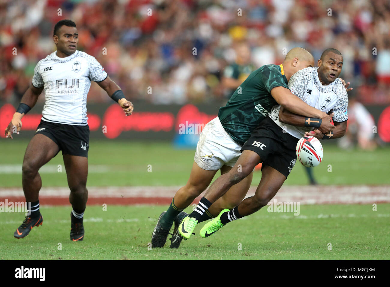 Singapore. 29th Apr, 2018. Alasio Sovita Naduva of Fiji (right) is ...