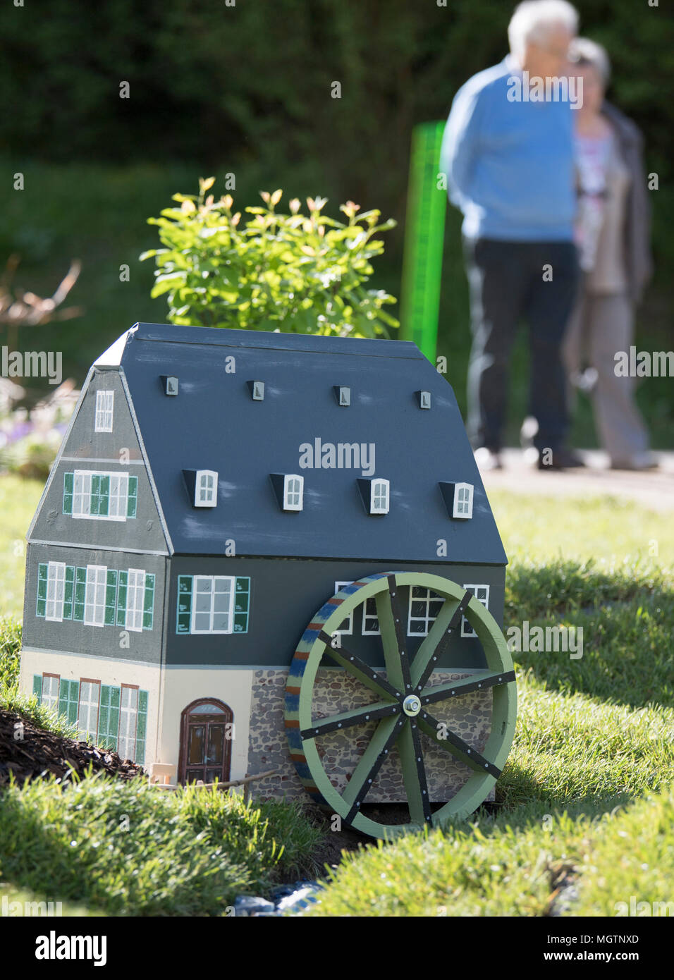 Bad Schwalbach, Germany. 28 April 2018. Visitors passing miniature ...