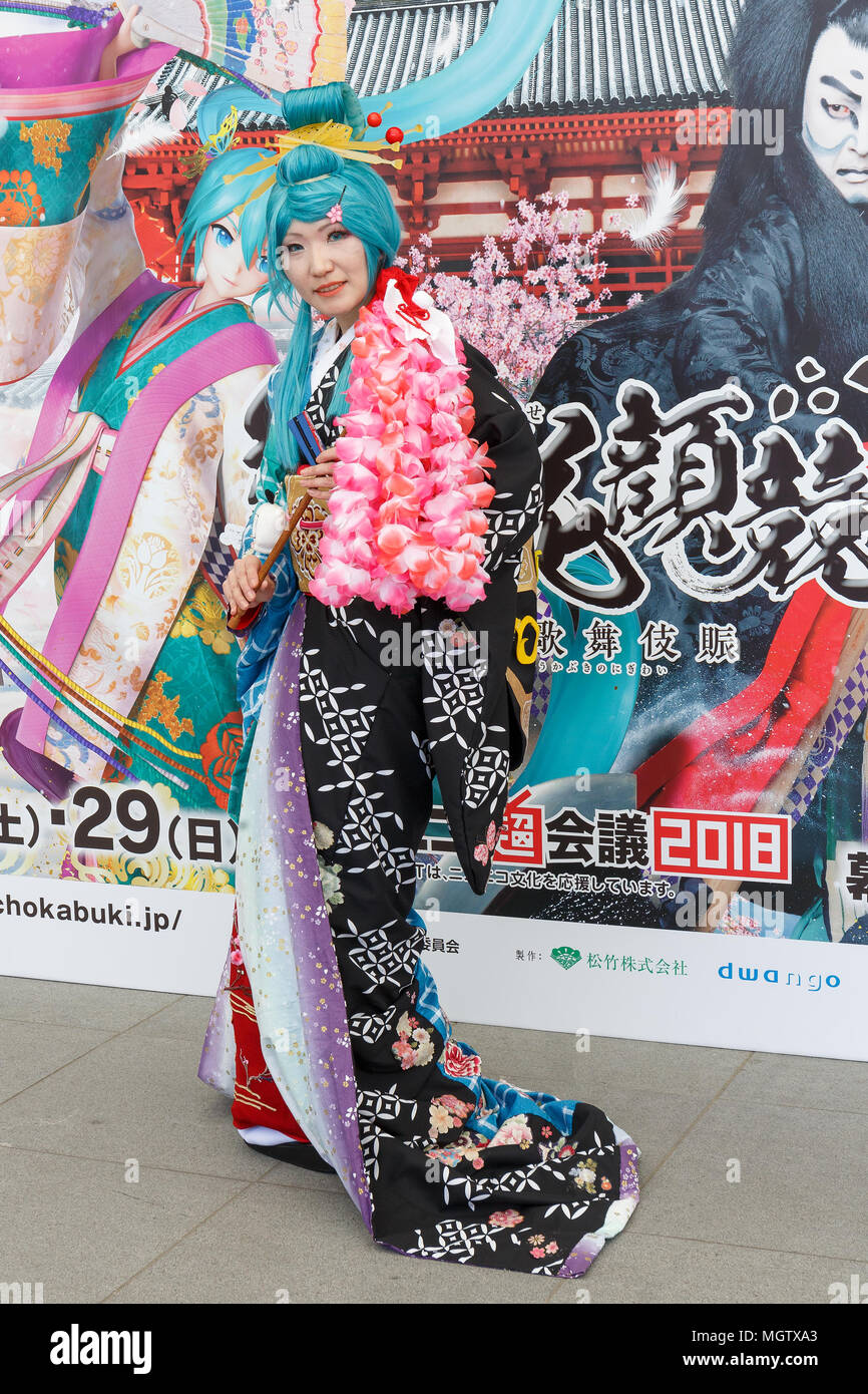 A cosplayer poses for a photograph during the Niconico Chokaigi ...