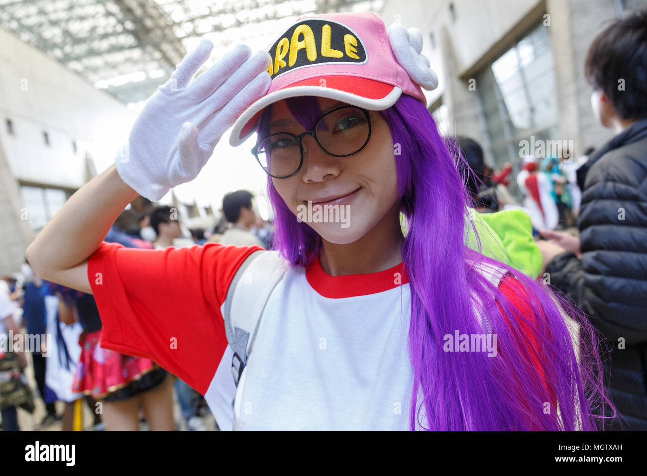 A cosplayer poses for a photograph during the Niconico Chokaigi ...