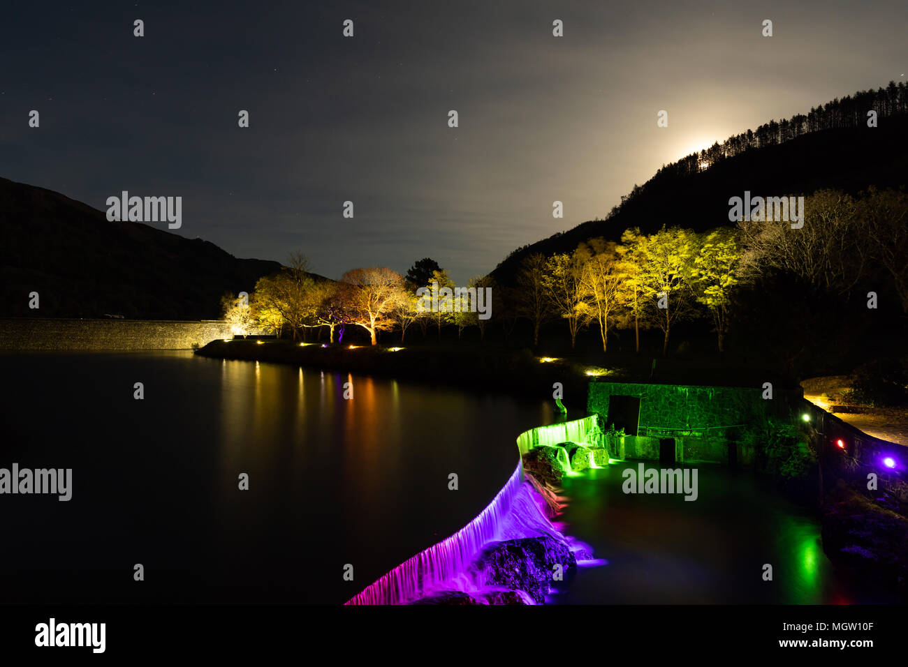 A long exposure photograph of CwmRheidol Reservoir at night showing the ...