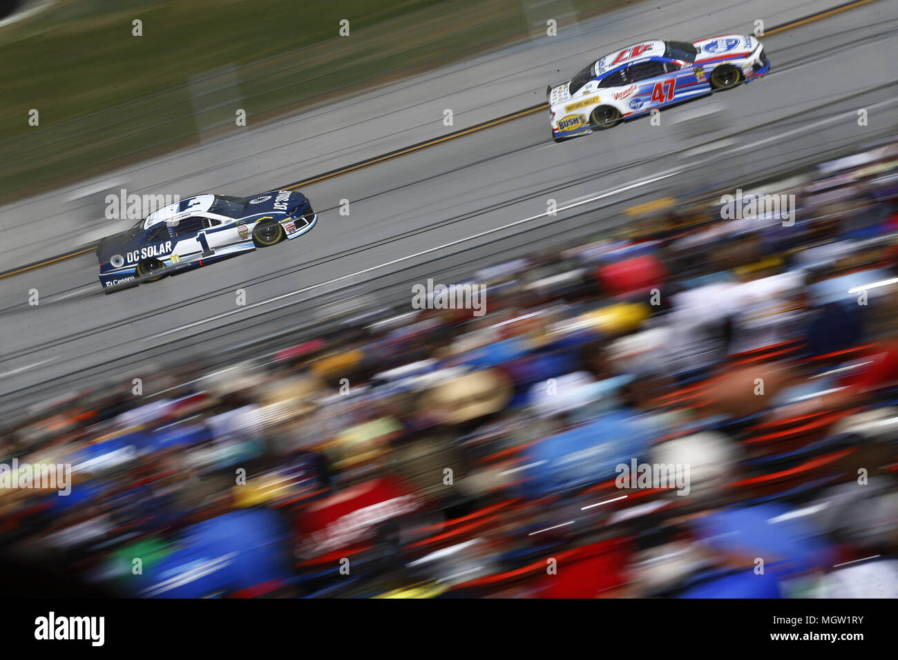 Talladega, Alabama, USA. 29th Apr, 2018. Jamie McMurray (1) brings his ...