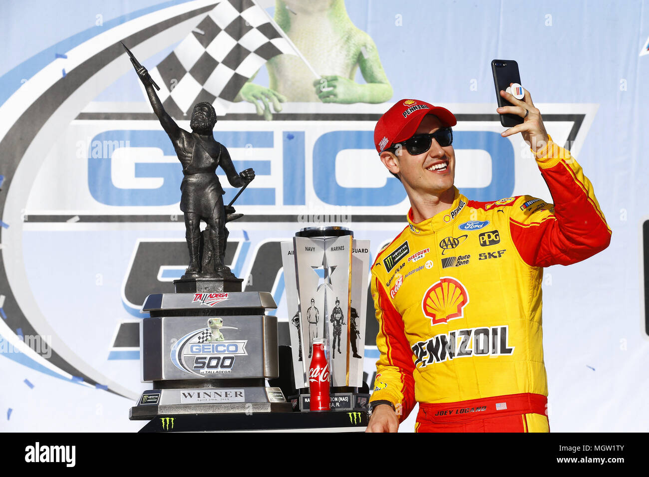 Talladega, Alabama, USA. 29th Apr, 2018. Joey Logano (22) celebrates in ...