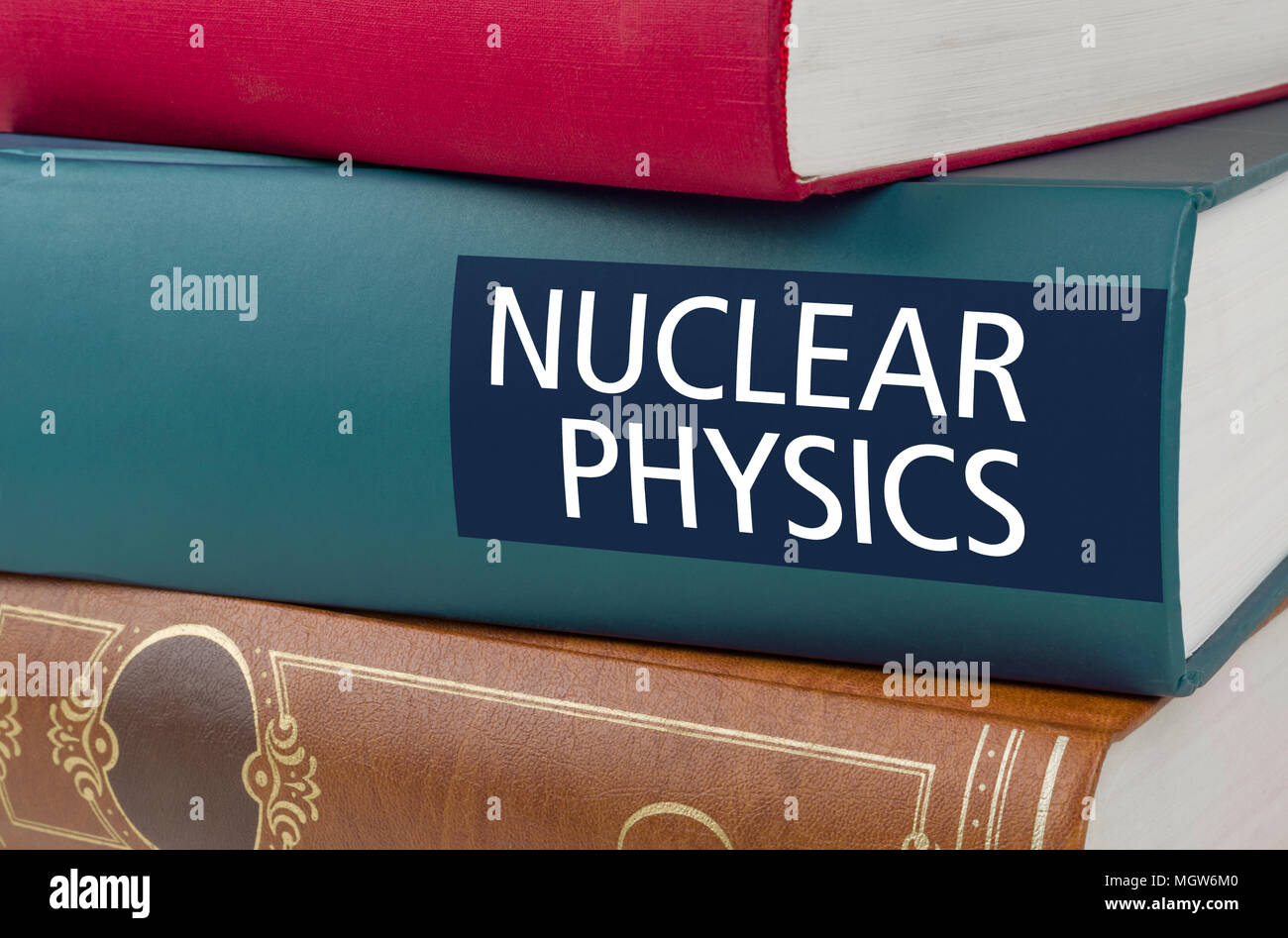 A book with the title Nuclear Physics written on the spine Stock Photo ...