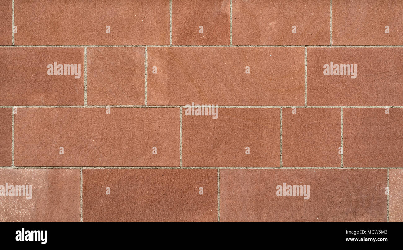 A red sandstone wall Stock Photo - Alamy