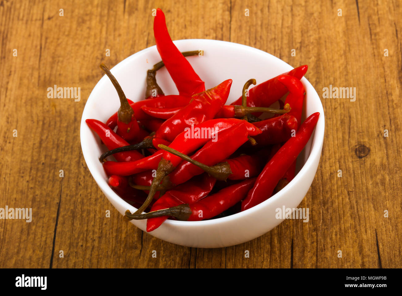 Pickled chili peppers Stock Photo - Alamy