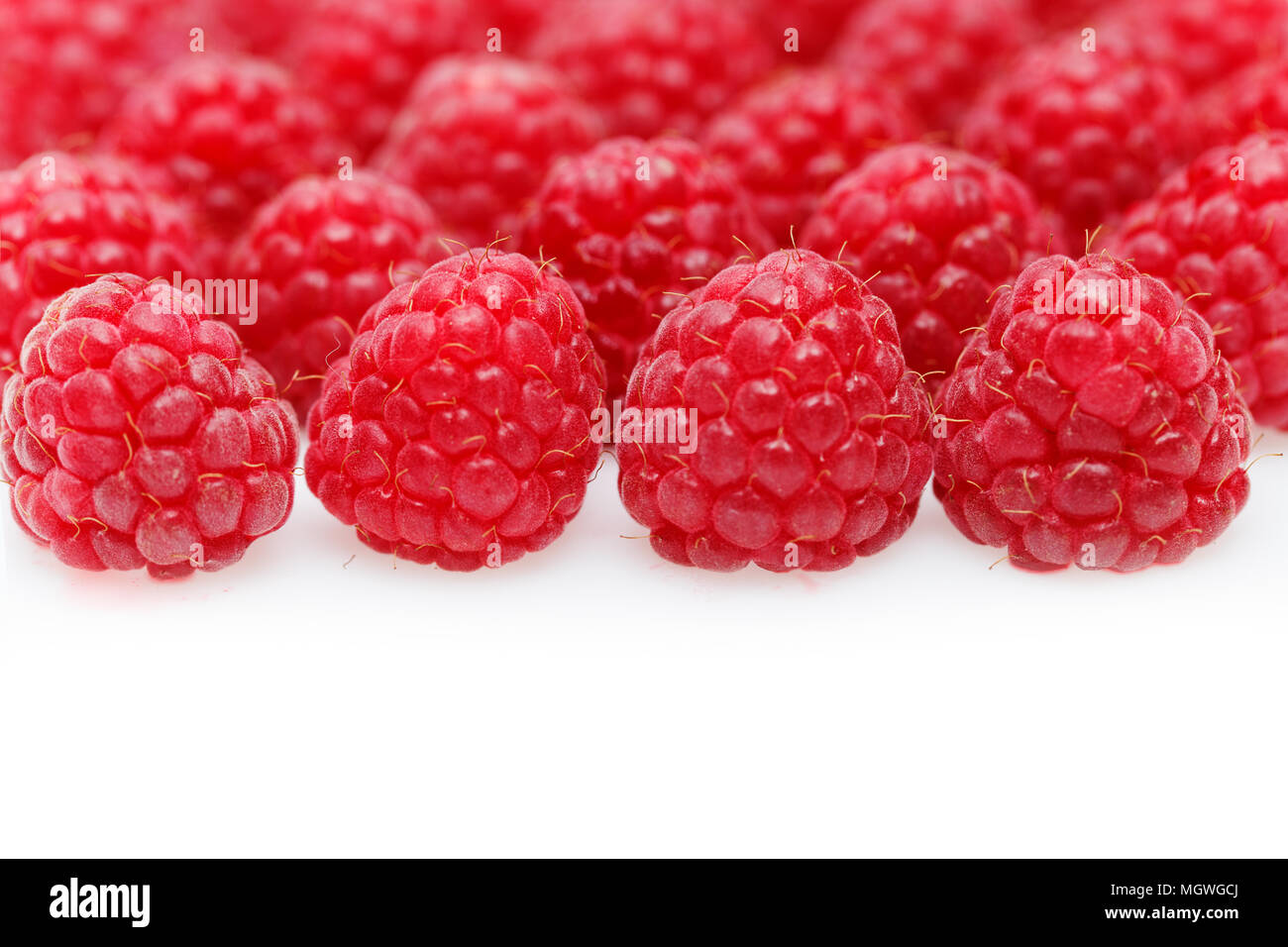 raspberry berries isolated on white Stock Photo - Alamy