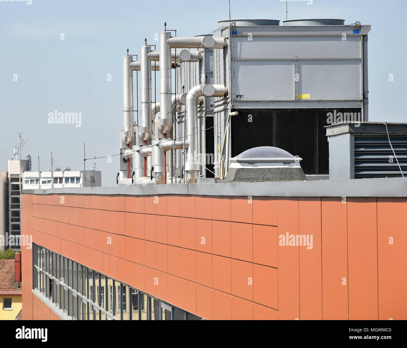 Air conditioners on the top of a building Stock Photo - Alamy