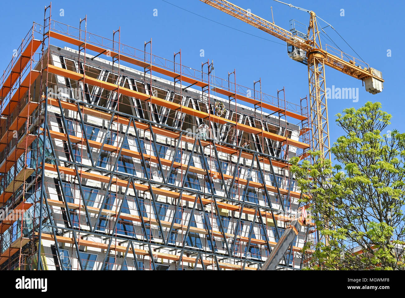 Construction of a new office building Stock Photo - Alamy